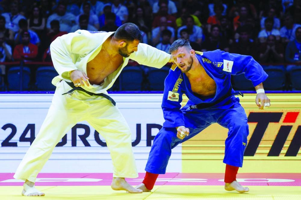 Gutsy Adamian storms to gold in men’s -100kg in fine style - Gulf Times