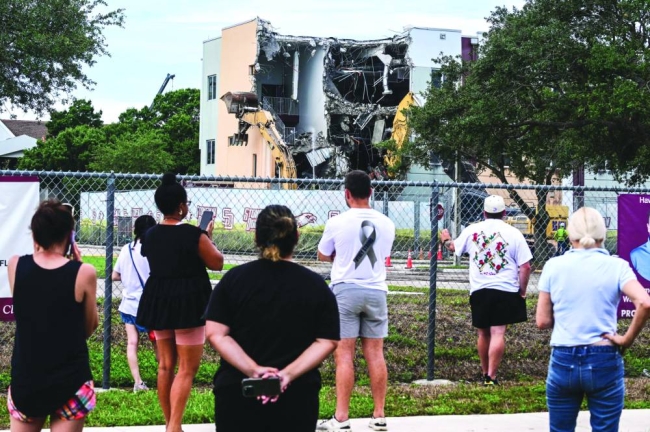 Crews raze building that was the scene of school shooting - Gulf Times