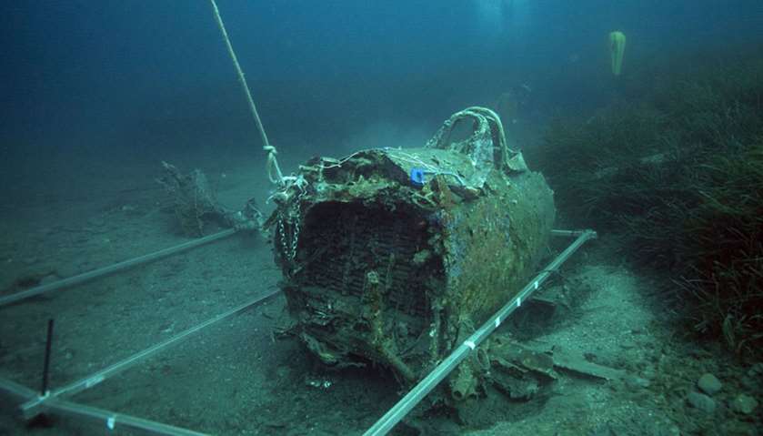 Divers explore the wreck of WWII fighter aircraft P47 Thunderbolt ...