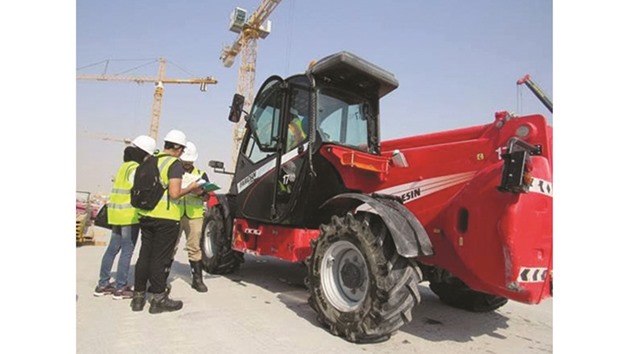 Students at rail worksite - Gulf Times