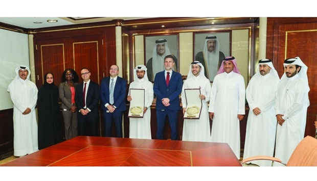 ExxonMobil Qatar presents 'special recognition' awards to long-term ...