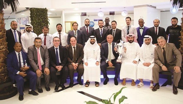 Qatar Islamic Bank recognises football team members for winning Aspire ...
