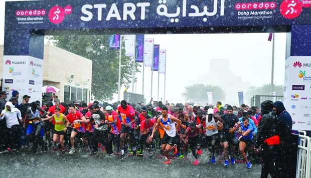 Thousands participate Ooredoo Doha Marathon joined by rains - Gulf Times