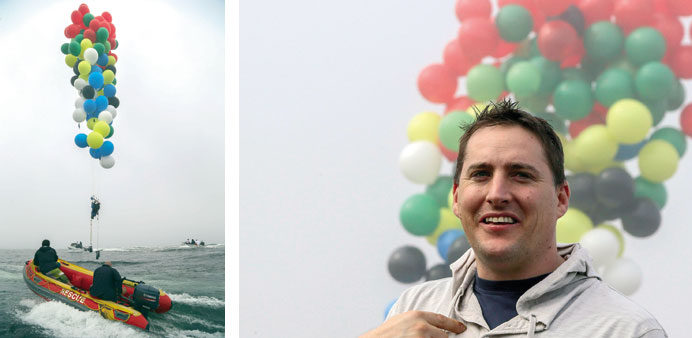 Man floats on balloons from Mandela prison - Gulf Times