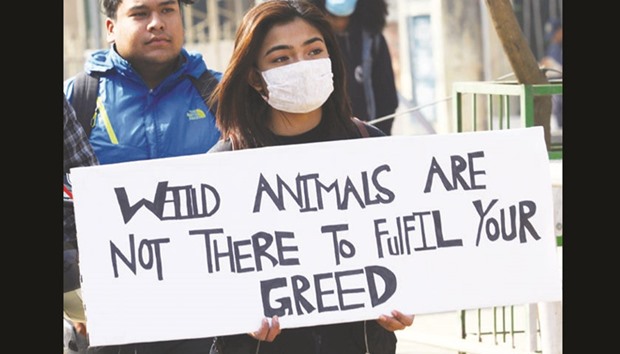 Protest against wildlife farming - Gulf Times