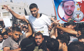 Footballer freed by Israel gets Gaza hero’s welcome - Gulf Times
