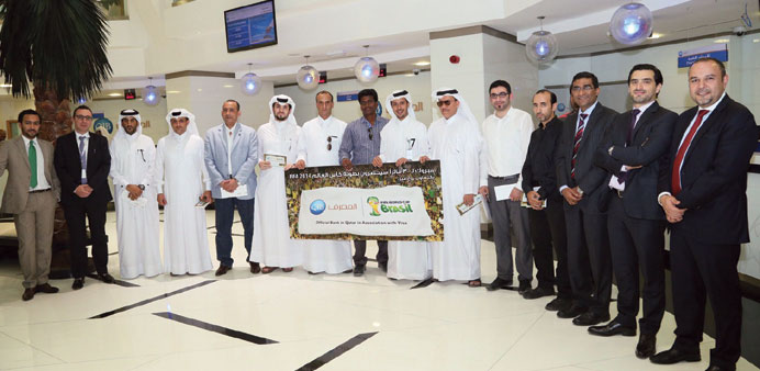 QIB, Visa pick 30 customers to watch FIFA WC in Brazil - Gulf Times