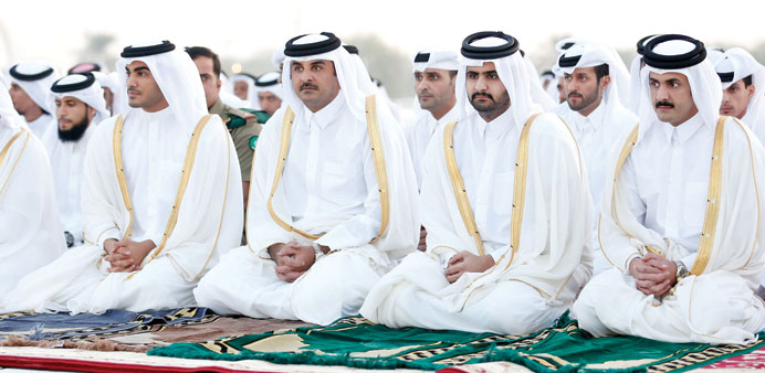 Emir, Father Emir attend Eid prayers - Gulf Times