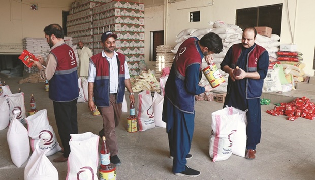 Qatar Charity distributes Ramadan baskets in Pakistan - Gulf Times