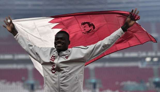 Haroun, Ashraf give Qatar golden momentum; Tosin grabs 100m silver ...