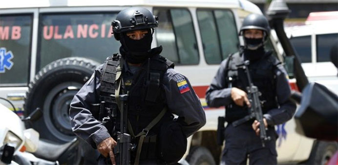 Venezuela arrests eight police officers after video of shooting - Gulf ...